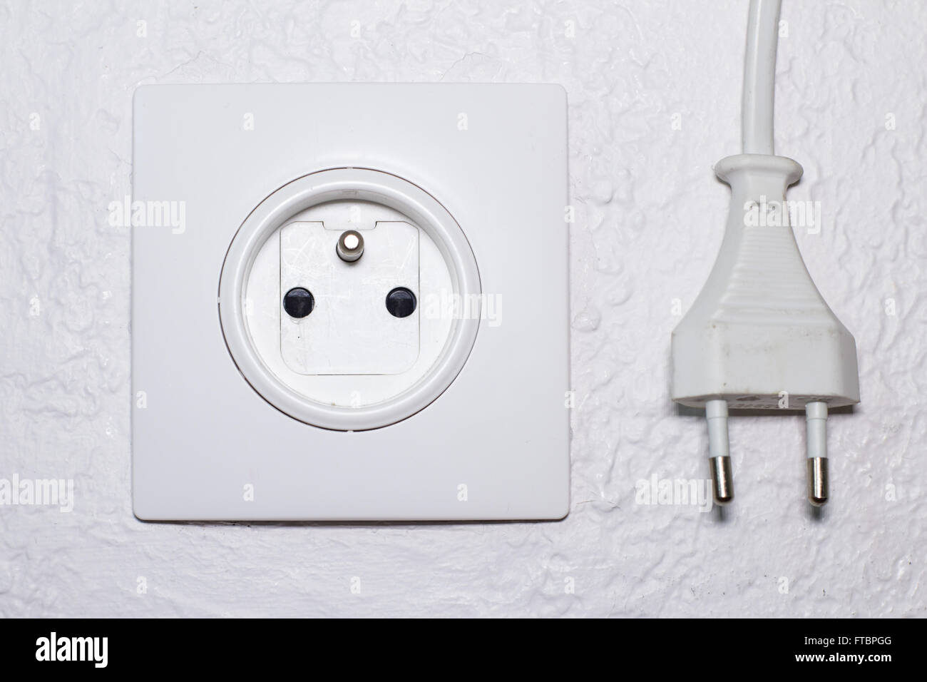Cable and wall socket hi-res stock photography and images - Alamy