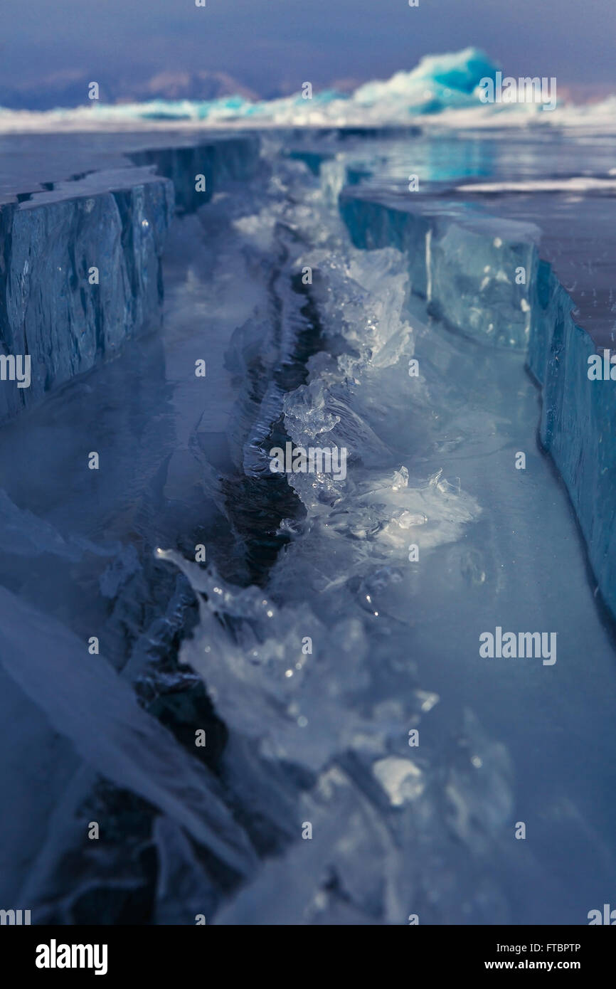 Large cracks on surface of the ice Stock Photo - Alamy