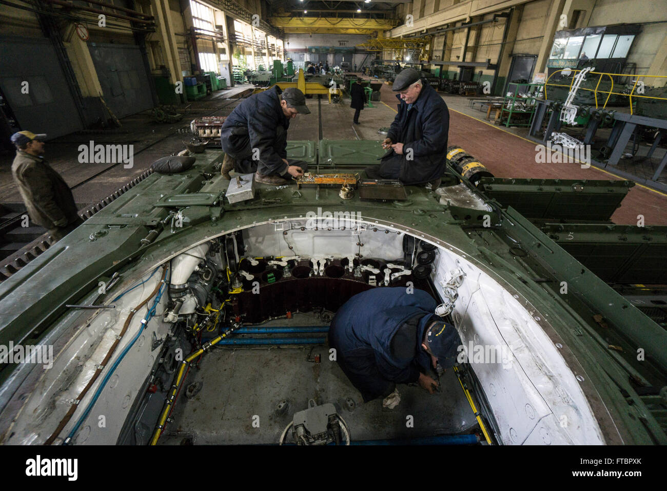 Tank repair works are carried out at the Lviv Armour Plant Stock Photo ...