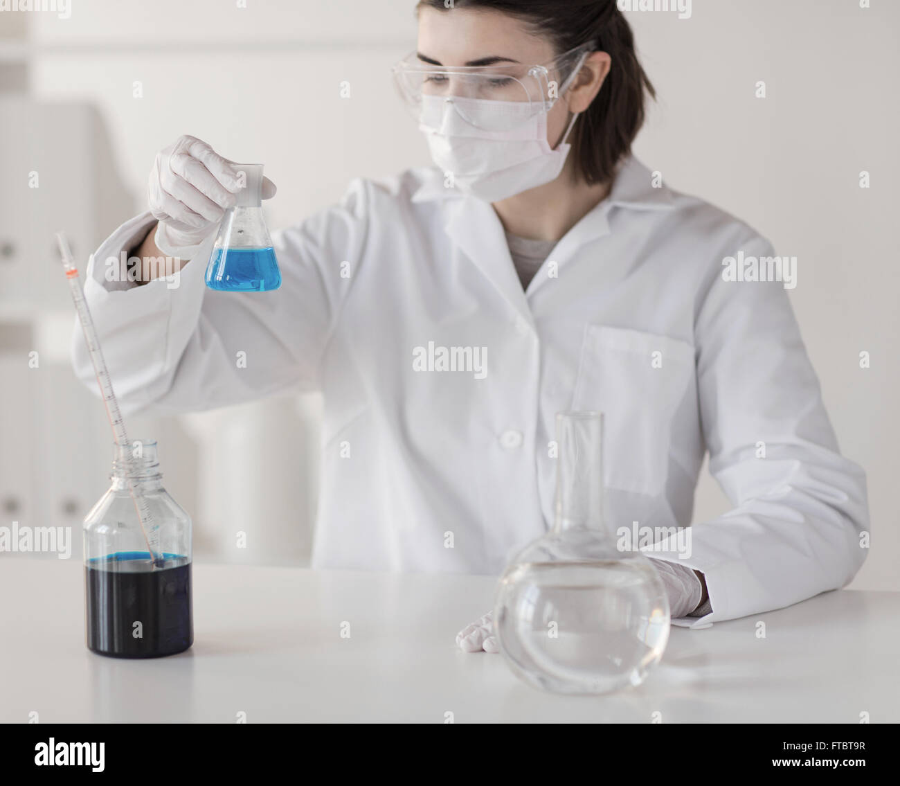 Scientist holding with jar hi-res stock photography and images - Alamy