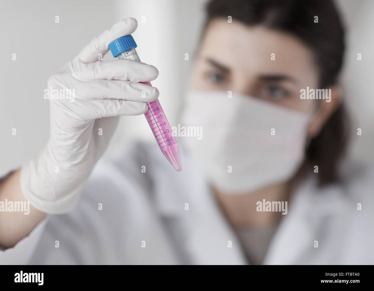 close up of scientist with tube making test in lab Stock Photo - Alamy