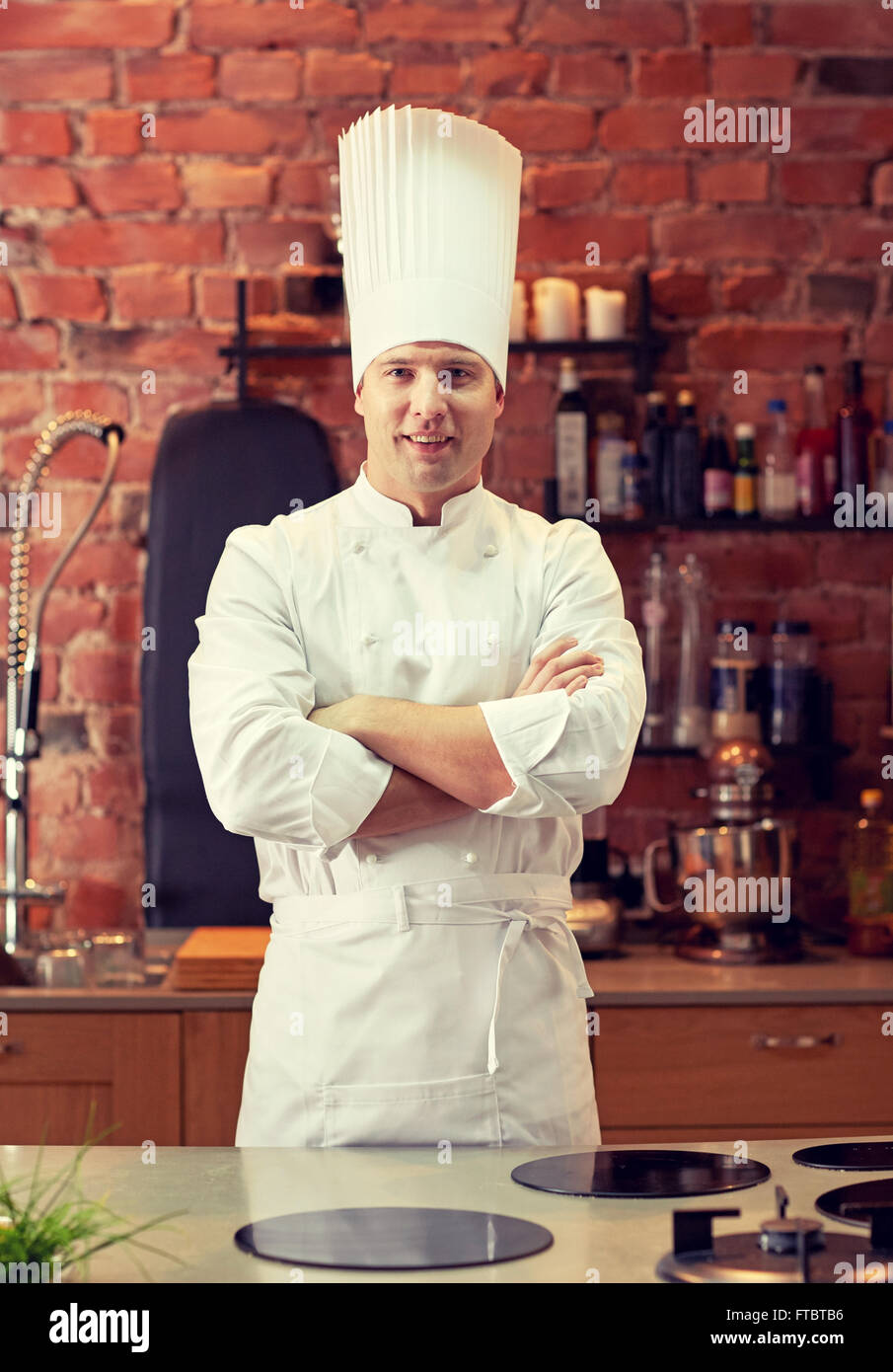 happy male chef cook in restaurant kitchen Stock Photo - Alamy