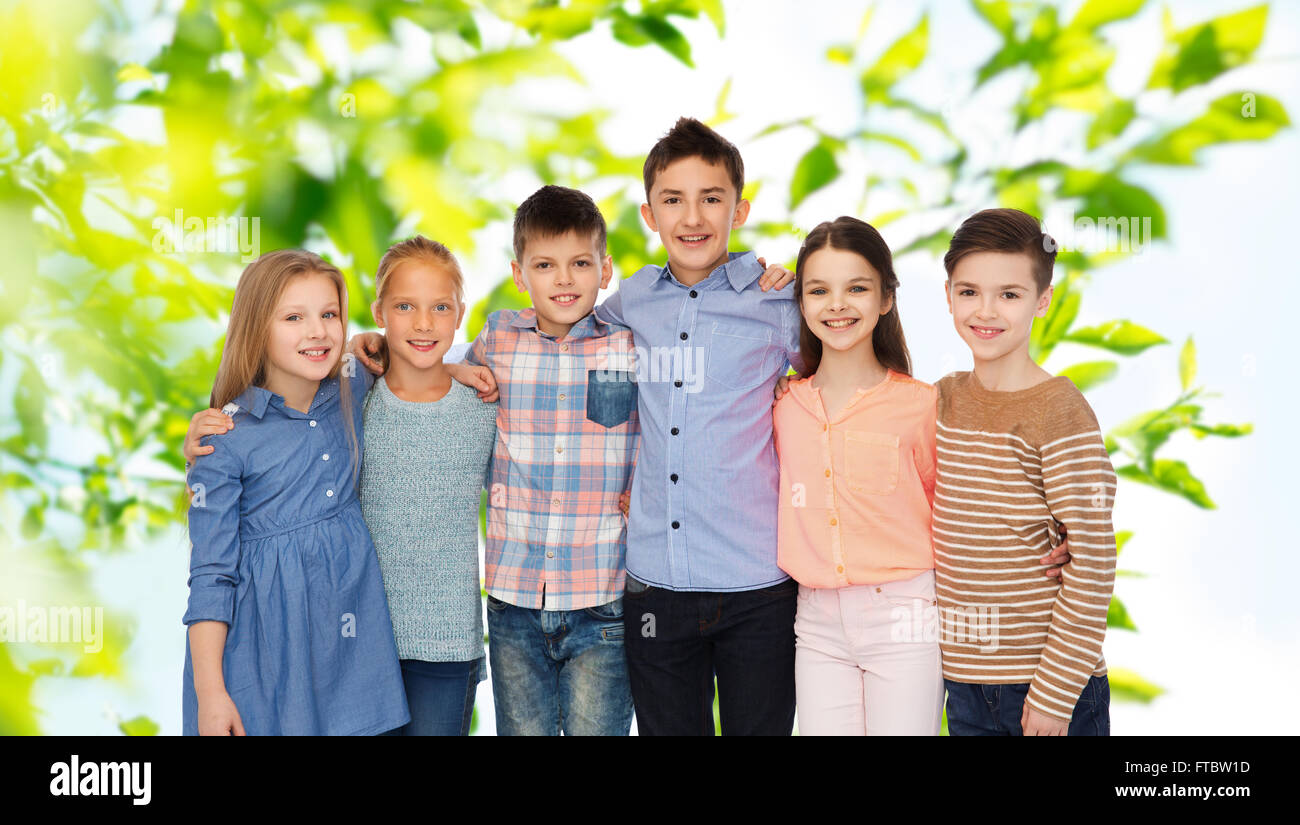 happy smiling children hugging Stock Photo - Alamy