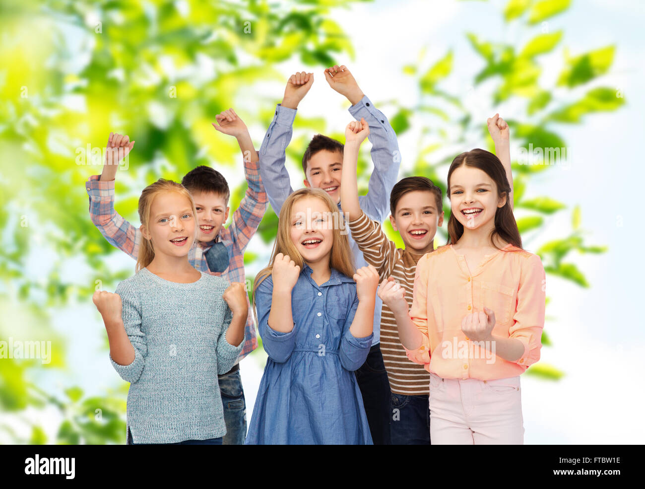 happy children celebrating victory Stock Photo - Alamy