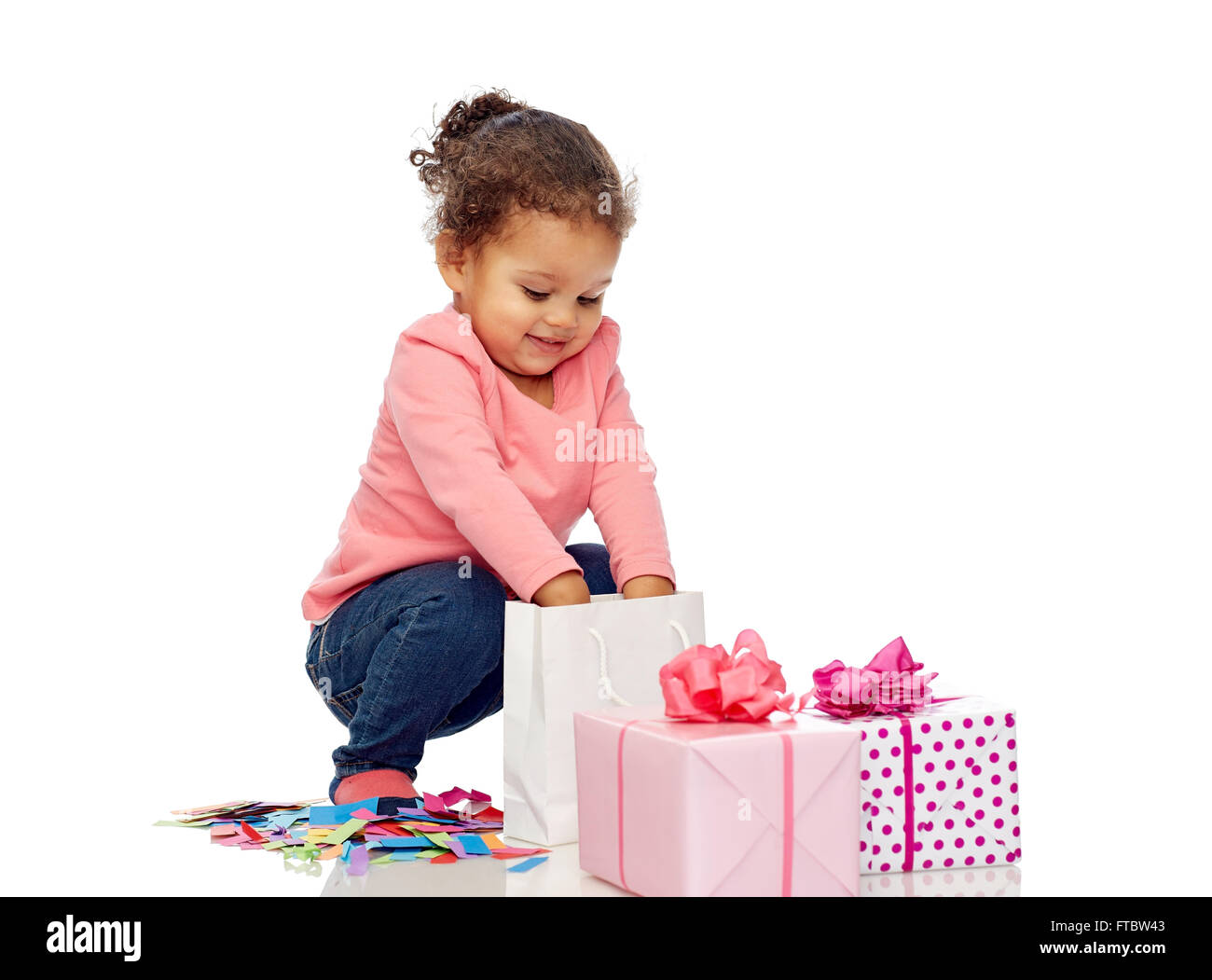 happy little baby girl with birthday presents Stock Photo - Alamy