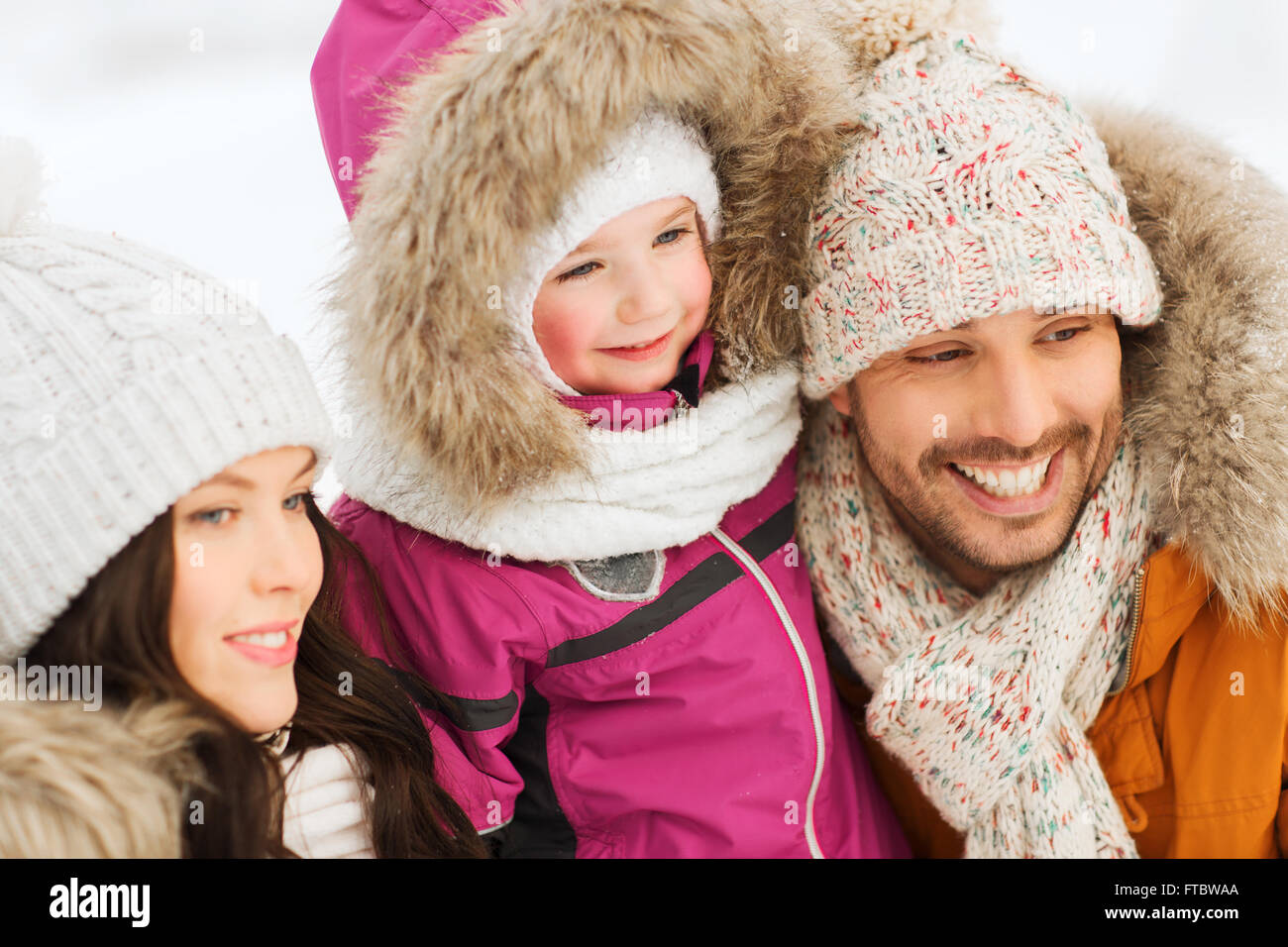 happy family with child in winter clothes outdoors Stock Photo - Alamy