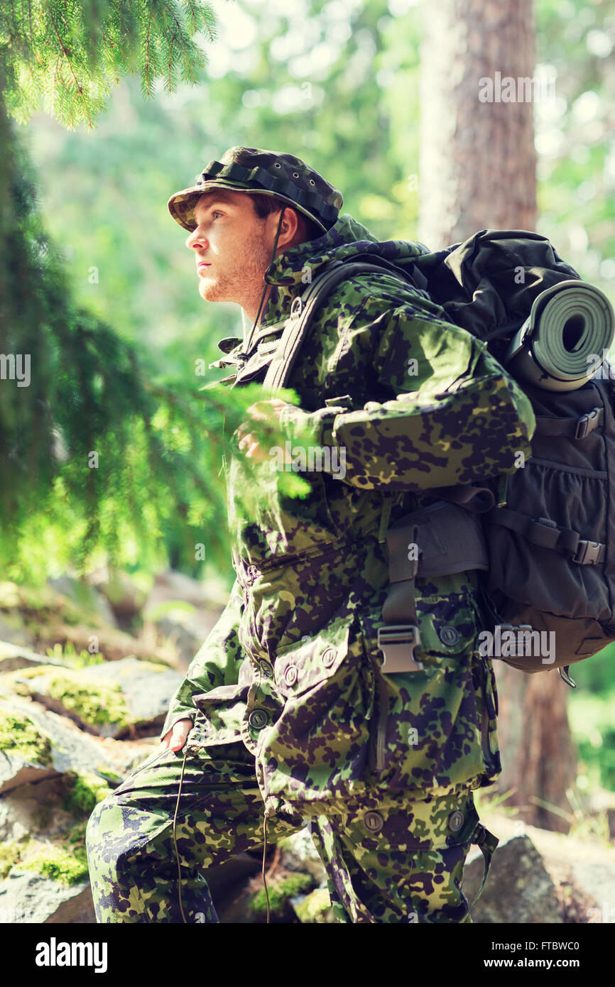 Young soldier backpack in forest hi-res stock photography and images ...