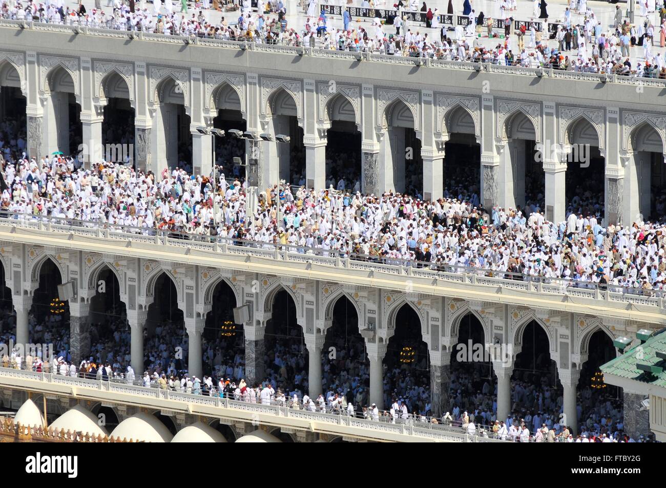Thousands of Muslim hajj pilgrims walk counter-clockwise around the ...