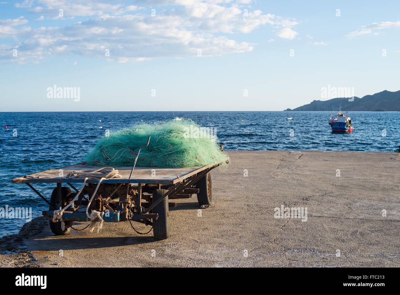 Traditional fishing nets in a small Mediterranean harbor Stock Photo ...
