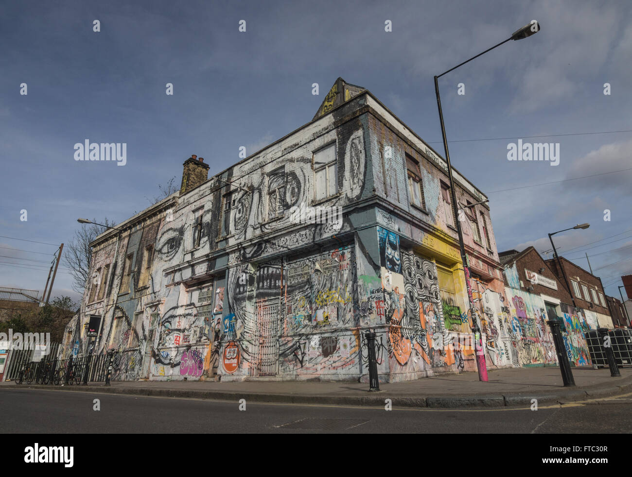 hackney Wick building covered in graffiti abandoned pub Stock Photo - Alamy