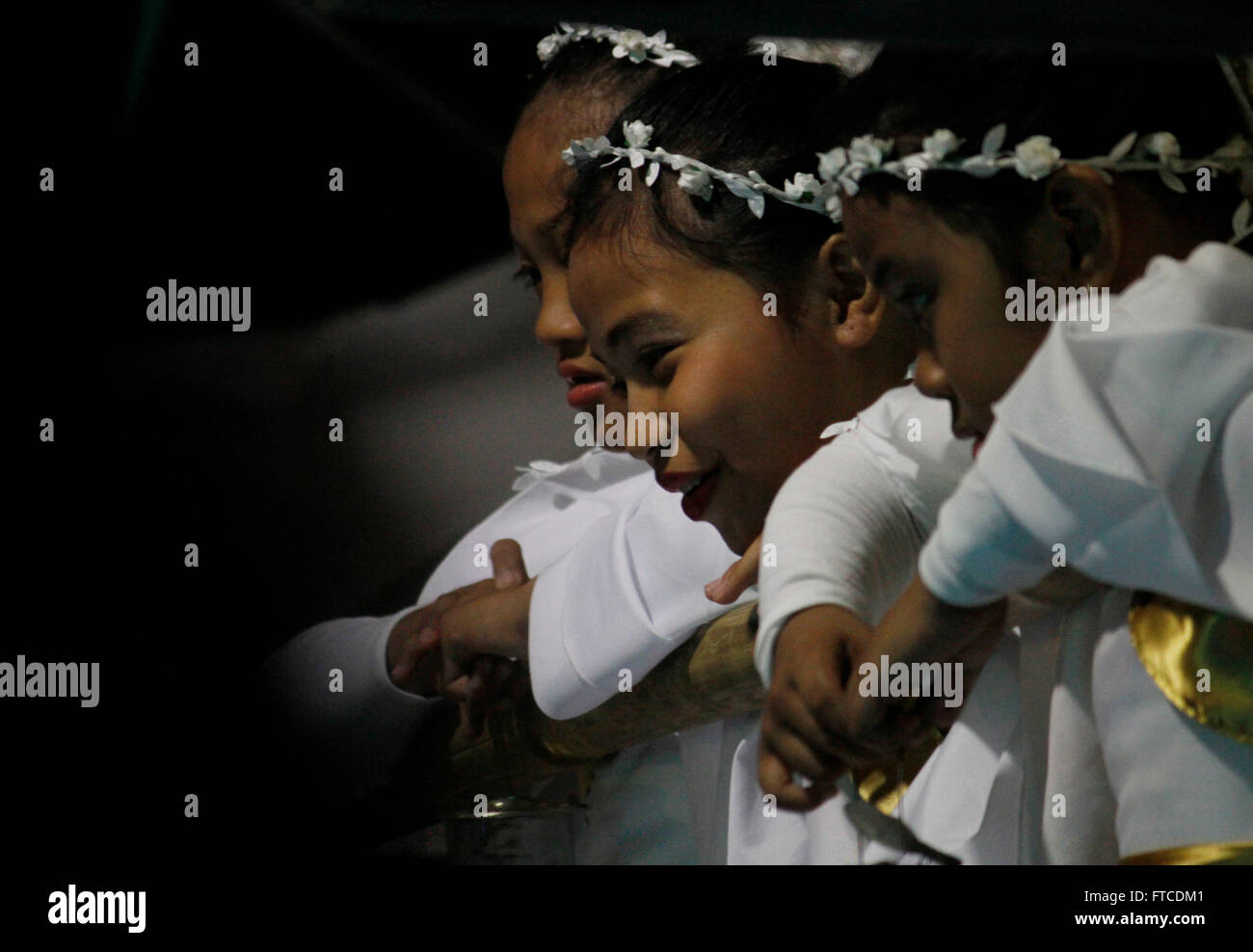 Filipino children dressed as angels participate at the Salubong-the ...