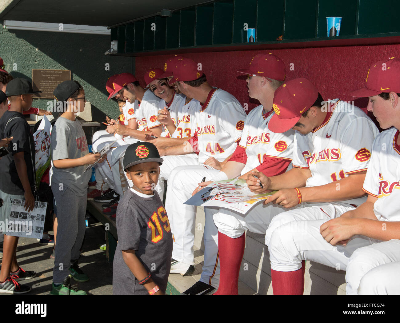 Los Angeles, CA, USA. 26th Mar, 2016. USC players sign autographs for ...
