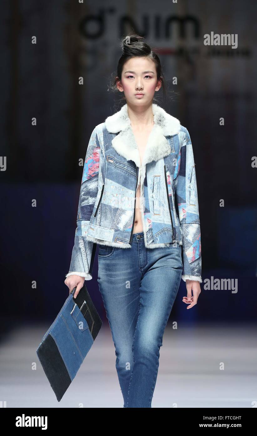 Beijing, China. 27th Mar, 2016. A model presents a creation of designer ...