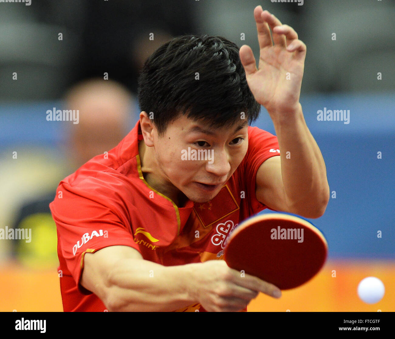 Doha, Qatar. 27th Mar, 2016. Ma Long of China competes during the semi ...