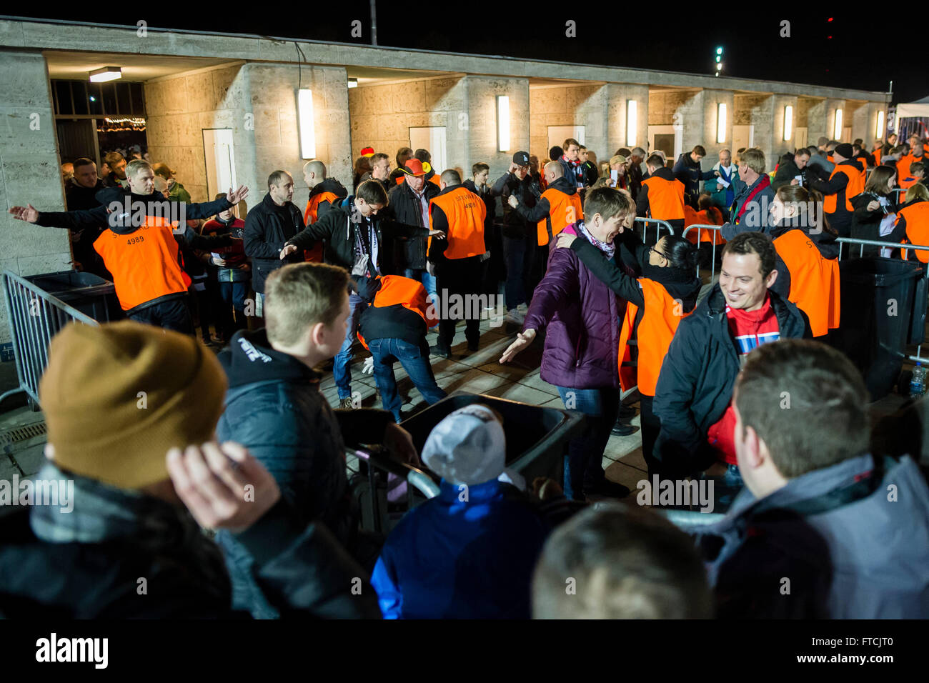 Berlin, Germany. 26th Mar, 2016. Viewers and fans are checked and ...