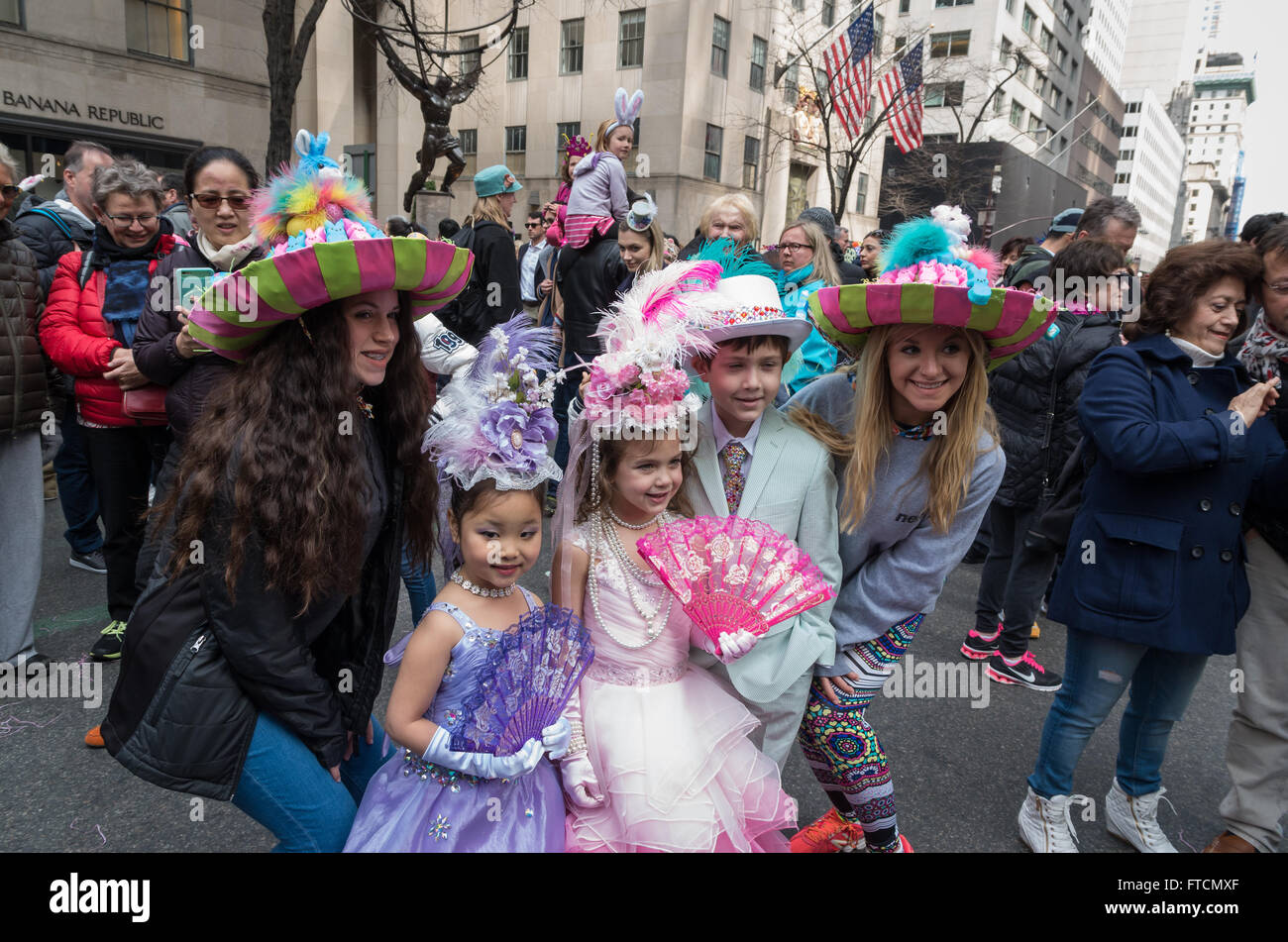 Children and teenagers posing for a photograph wearing elaborate ...