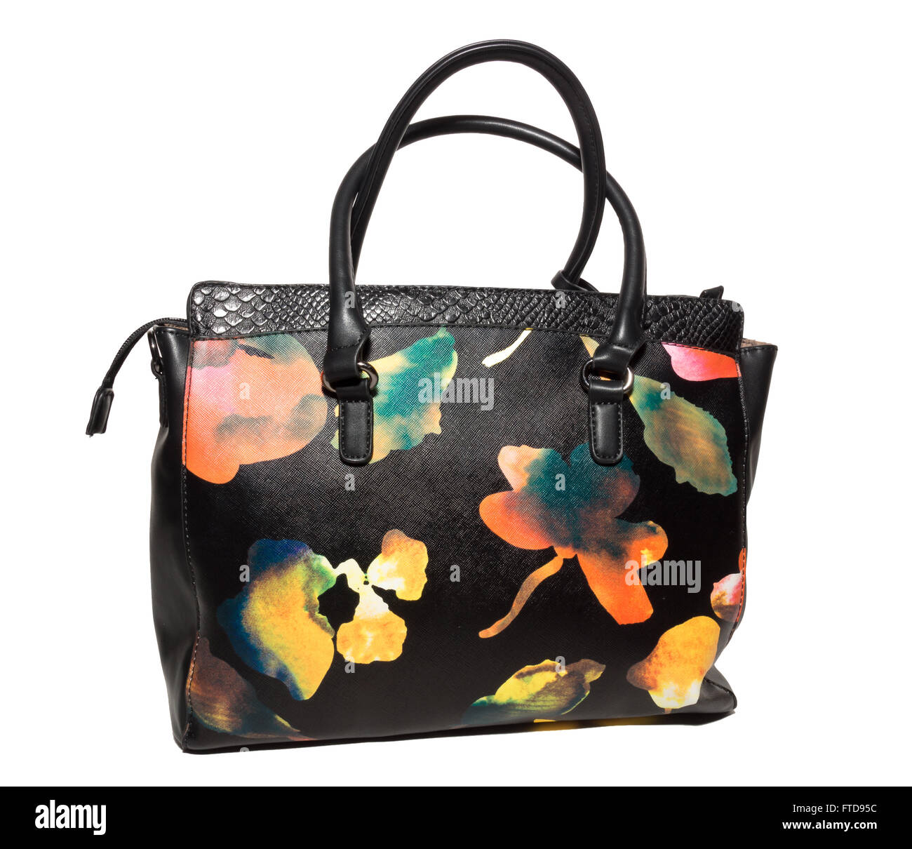 The photograph shows a female handbag on a white background Stock Photo ...