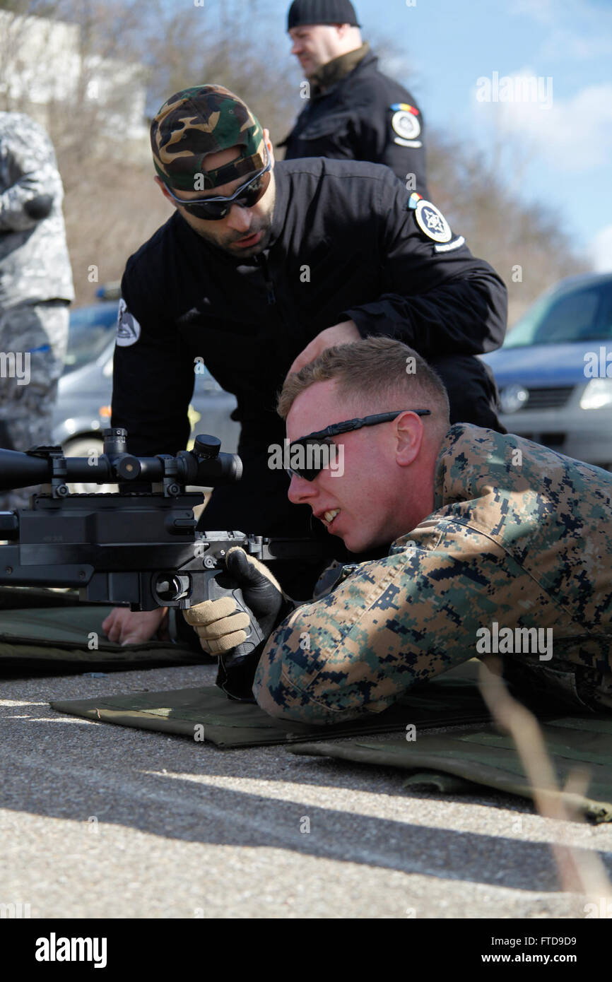 U.S. Marine Lance Cpl. Mathew Waltzer from FASTEUR shoots an APR 308 ...