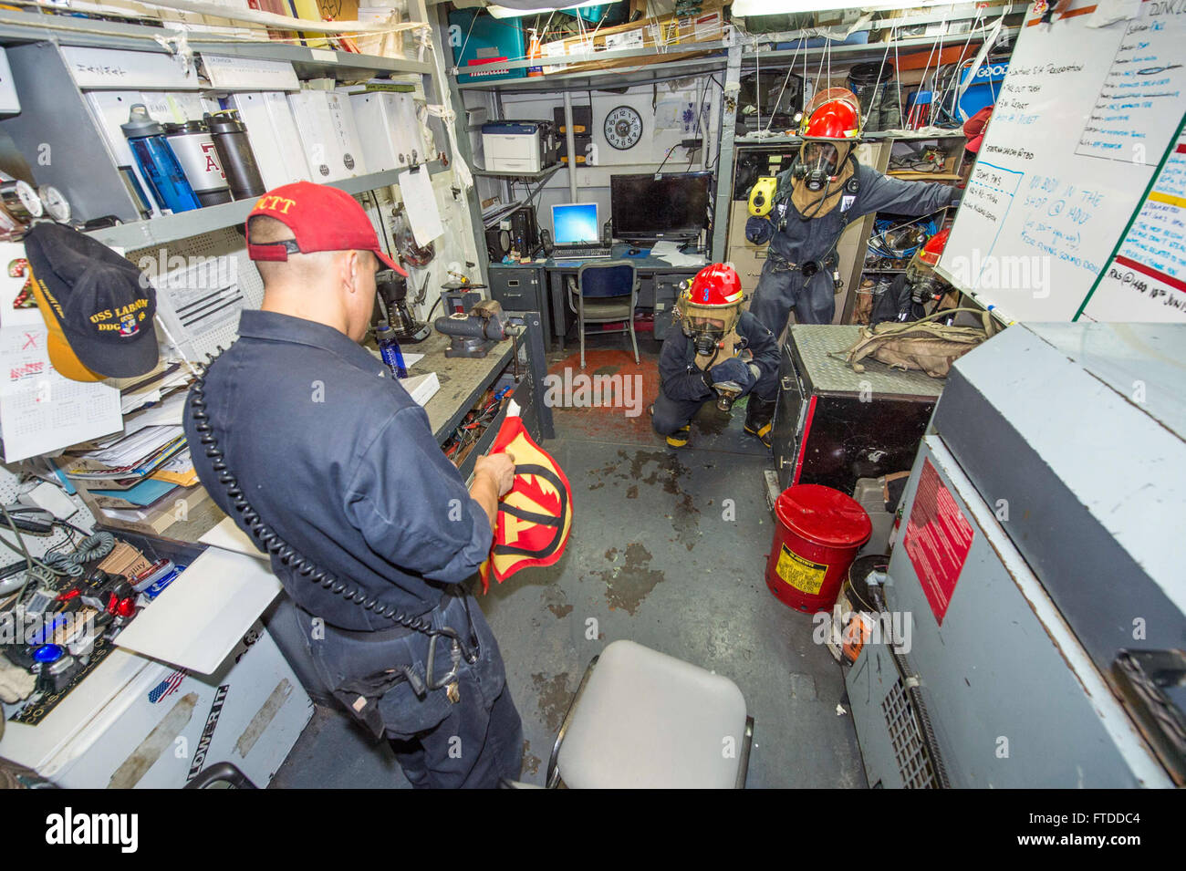 U s navy damage control fireman hi-res stock photography and images - Alamy