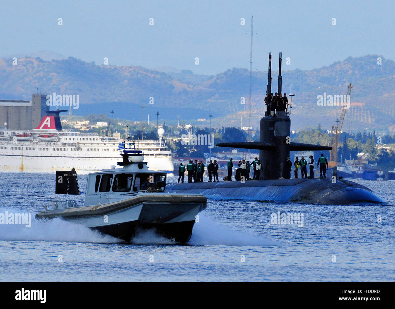 SOUDA BAY, Greece (Sep 23, 2013) - A harbor security boat patrols the ...