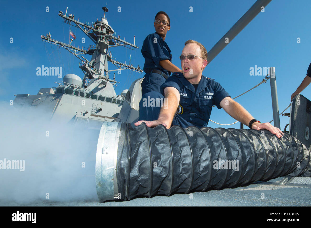 U s navy damage control fireman hi-res stock photography and images - Alamy