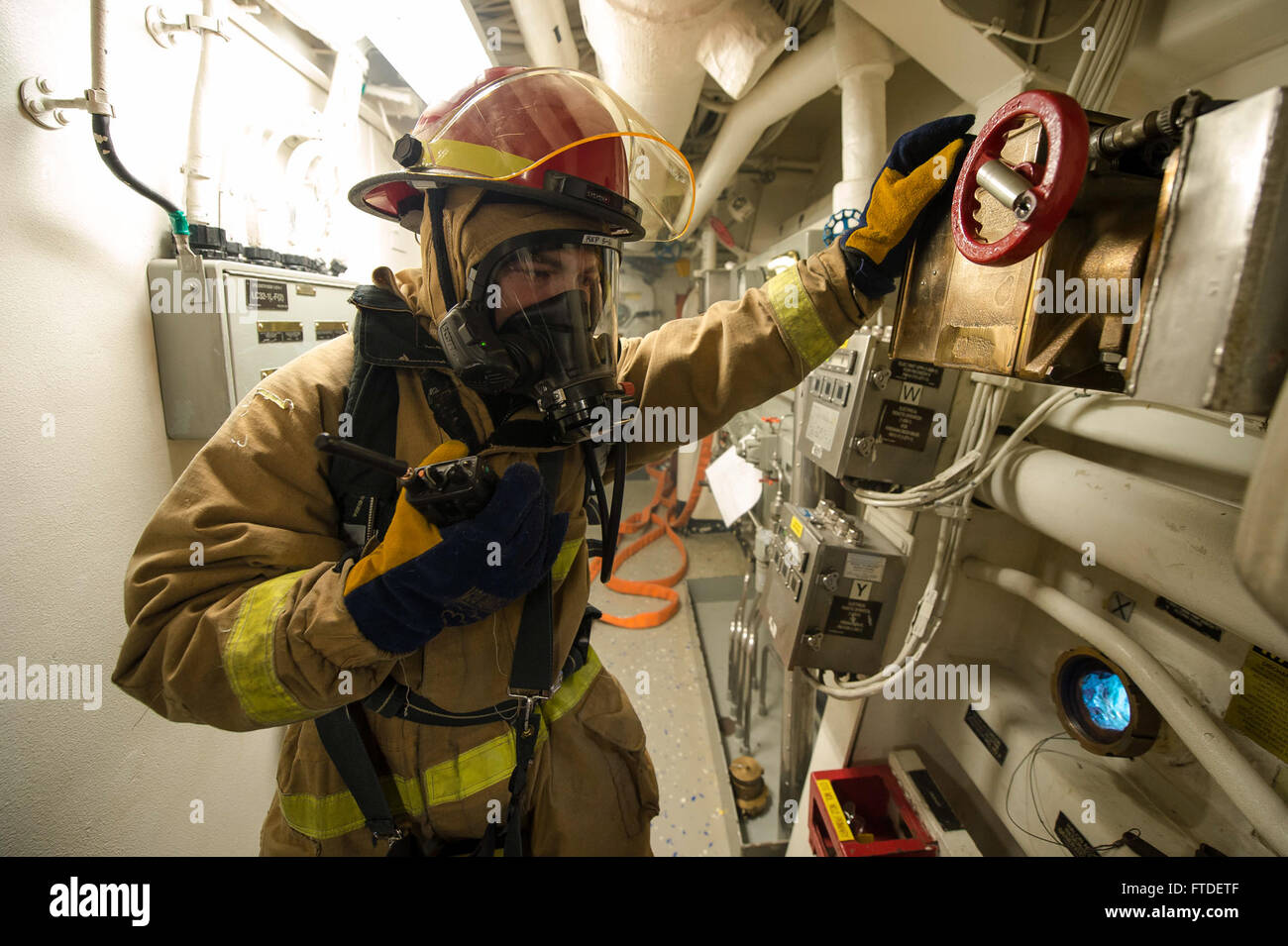 U s navy damage control fireman hi-res stock photography and images - Alamy