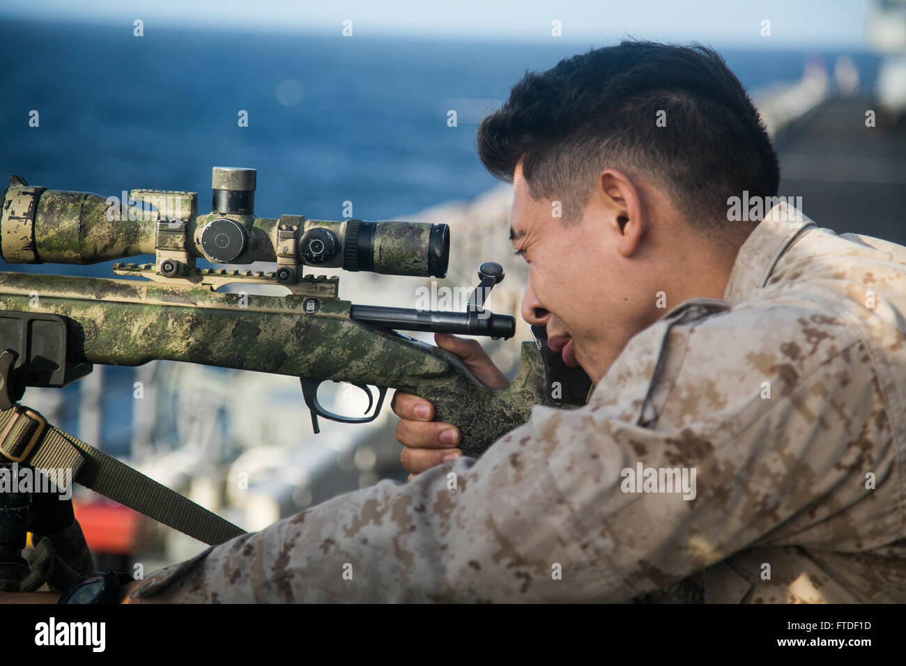 INDIAN OCEAN (July 21, 2015) U.S. Marine Cpl. Roberto Sauceda looks ...