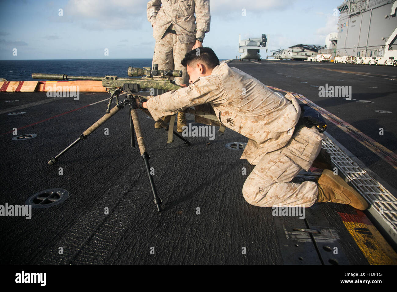 INDIAN OCEAN (July 21, 2015) U.S. Marine Cpl. Roberto Sauceda prepares ...