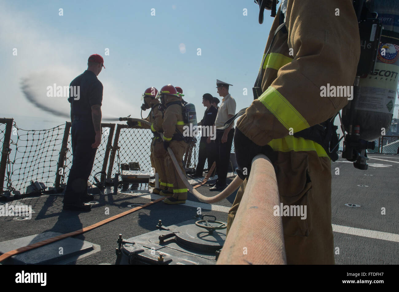 Fire hose handling techniques hi-res stock photography and images - Alamy