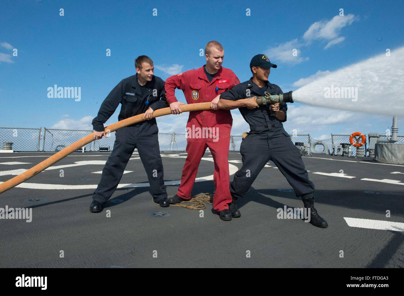 Fire hose handling hi-res stock photography and images - Alamy