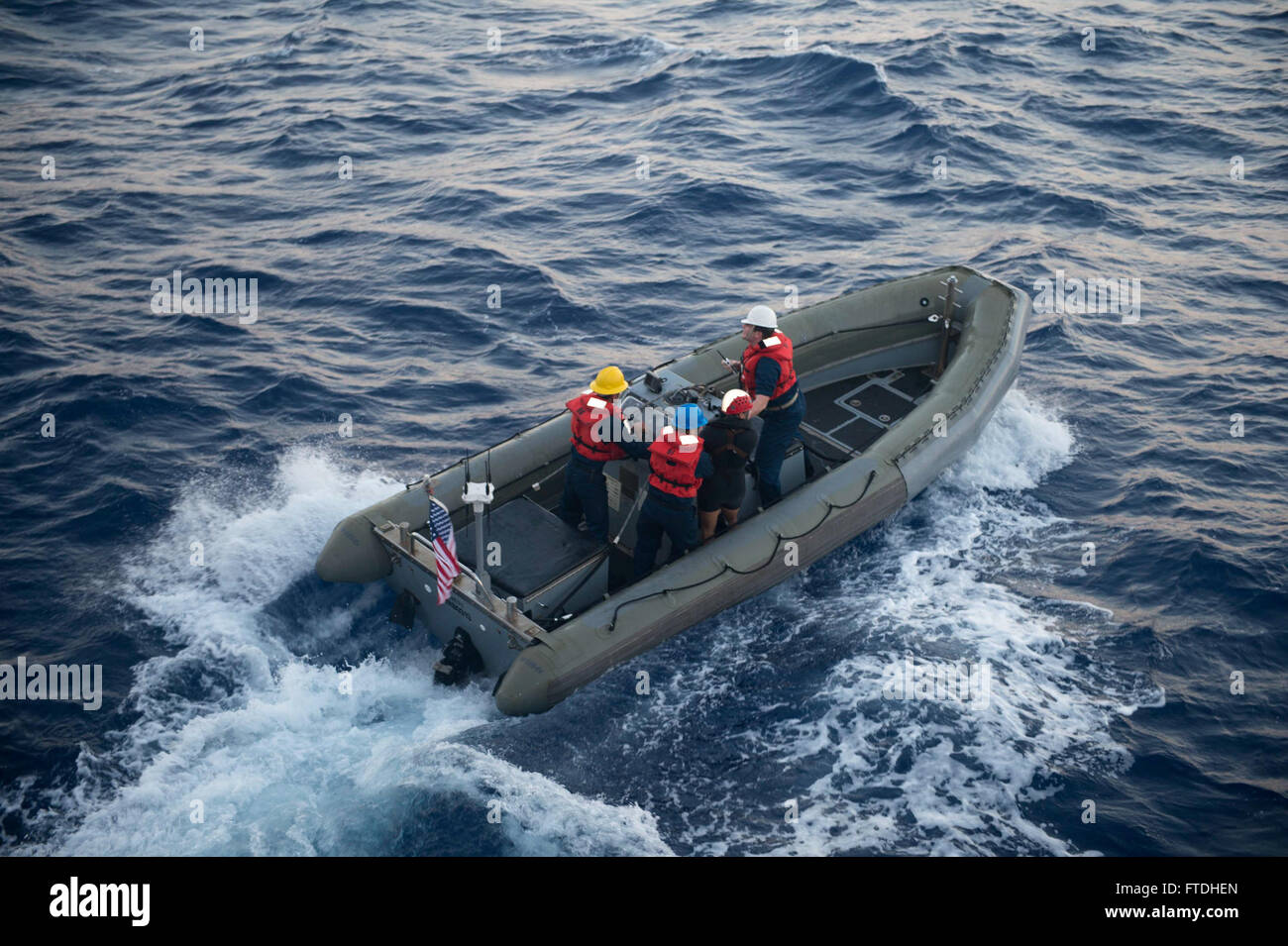 MEDITERRANEAN SEA (Oct. 11, 2013) - Sailors maneuver a rigid hull ...