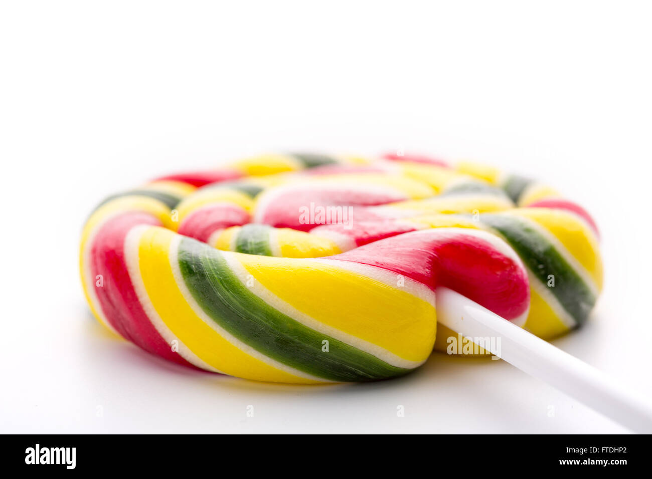 Lollipop on white Stock Photo - Alamy