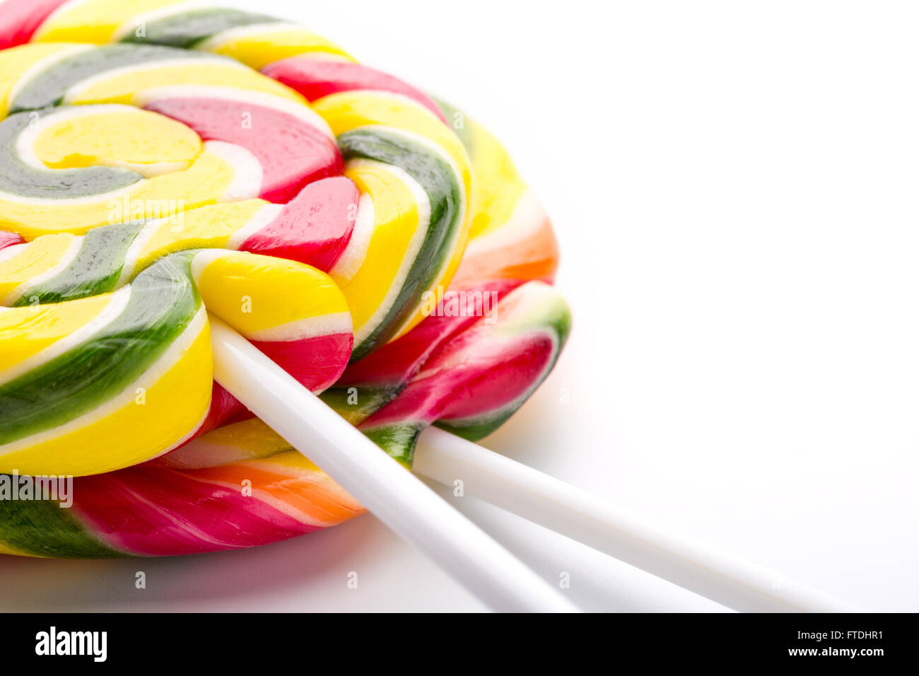 Lollipop on white Stock Photo - Alamy