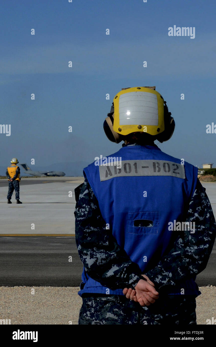 U.S. sailors at Naval Support Activity Souda Bay prepare the newly ...
