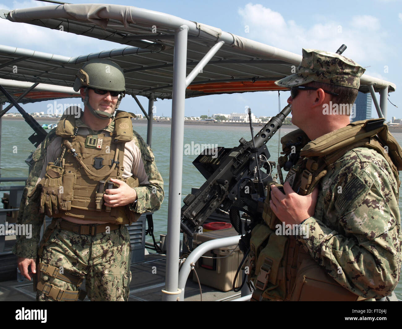 Lt. Sean Fay and Chief Gunner's Mate Brian Mulvaine, members of the U.S ...