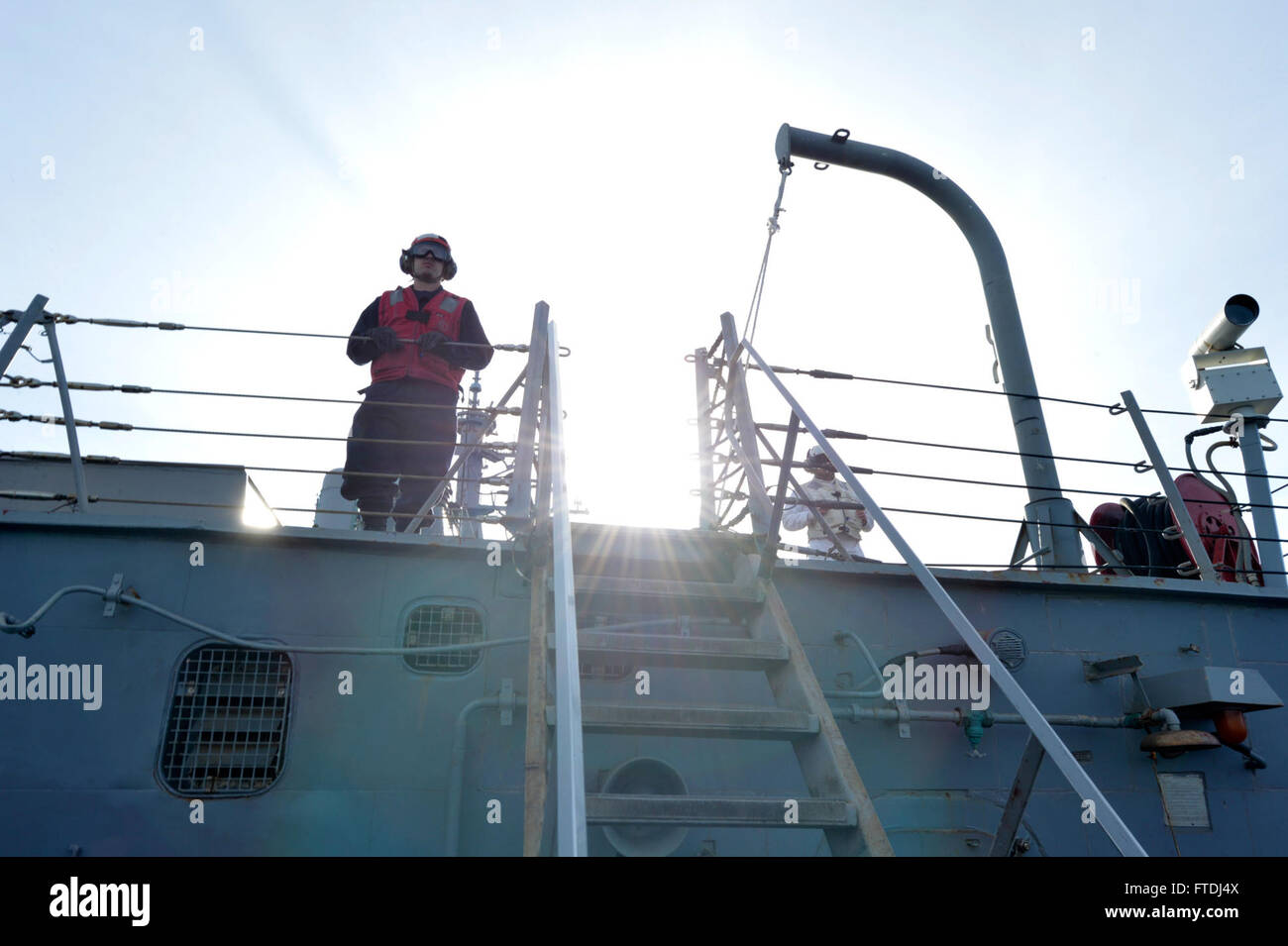 On November 25, 2015, sailors aboard USS Ross (DDG 71), an Arleigh ...