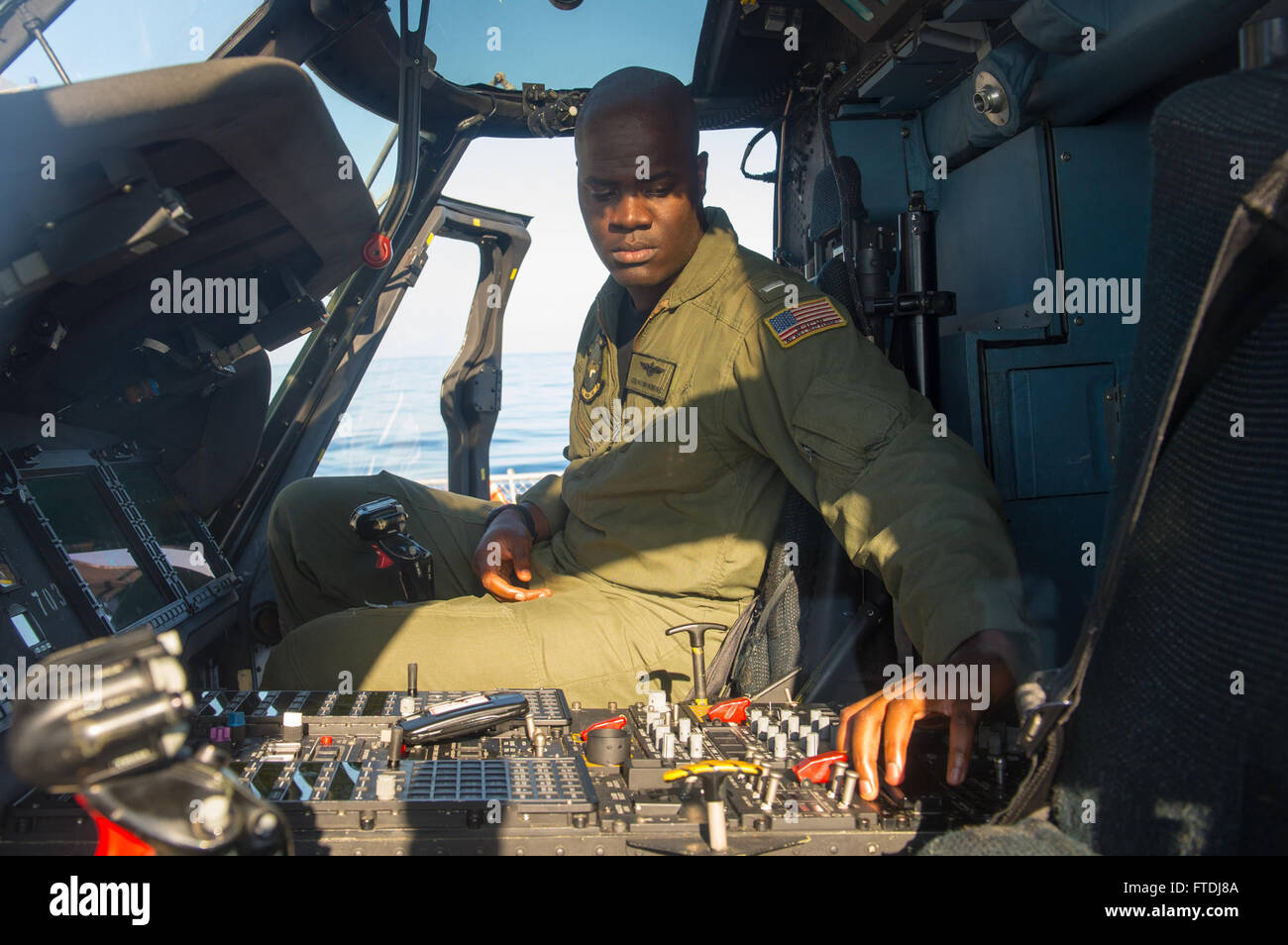 Lt. j.g. Diego McKnight of Helicopter Maritime Strike Squadron HMS 74 ...