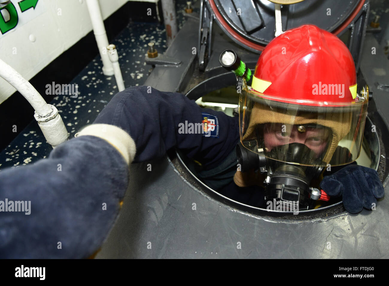This photo shows Damage Controlman Fireman Christian Sanchez-Bartz of ...