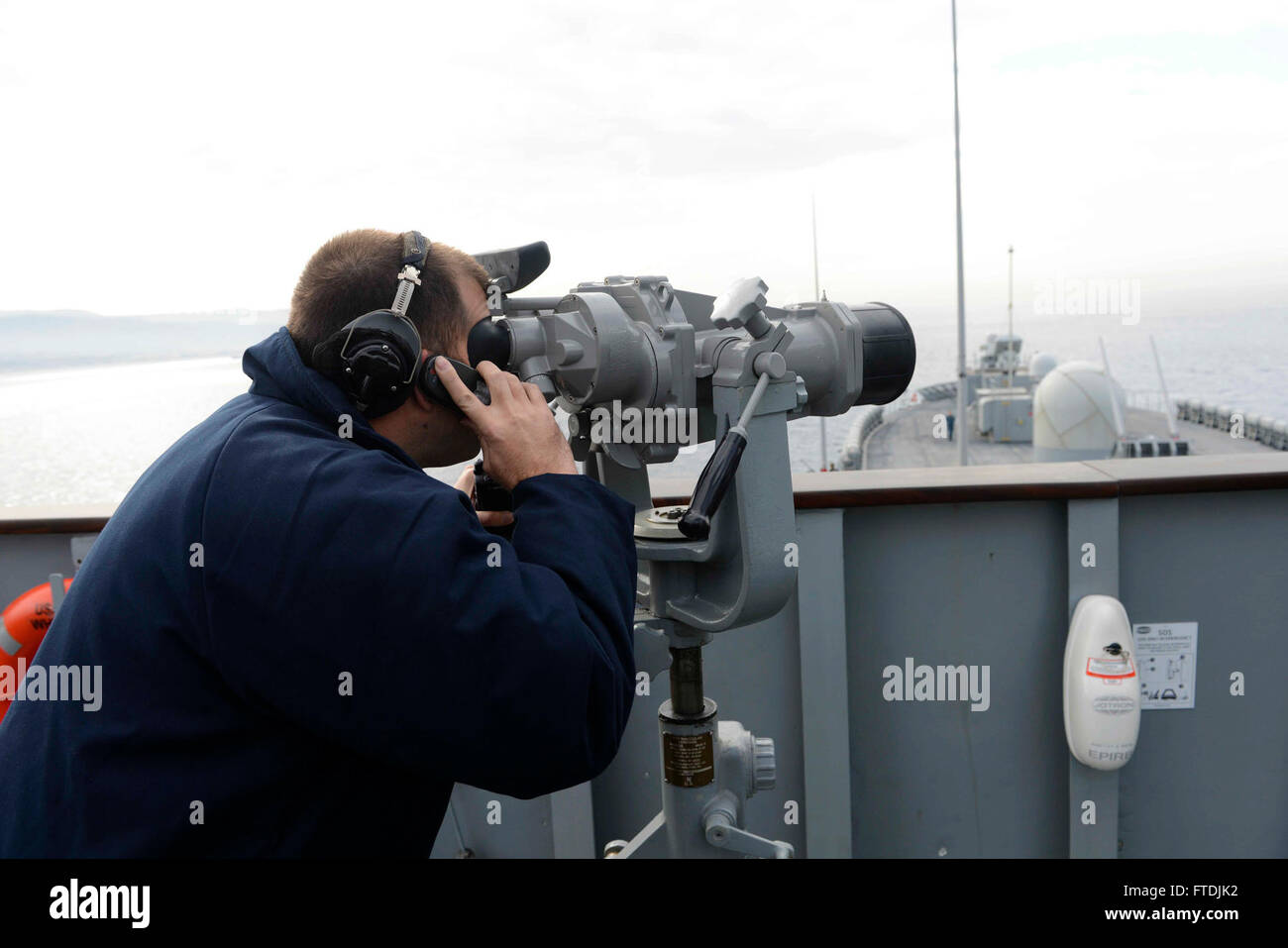 Chief Gunner's Mate Harry Kindt is seen aboard USS Mount Whitney (LCC ...