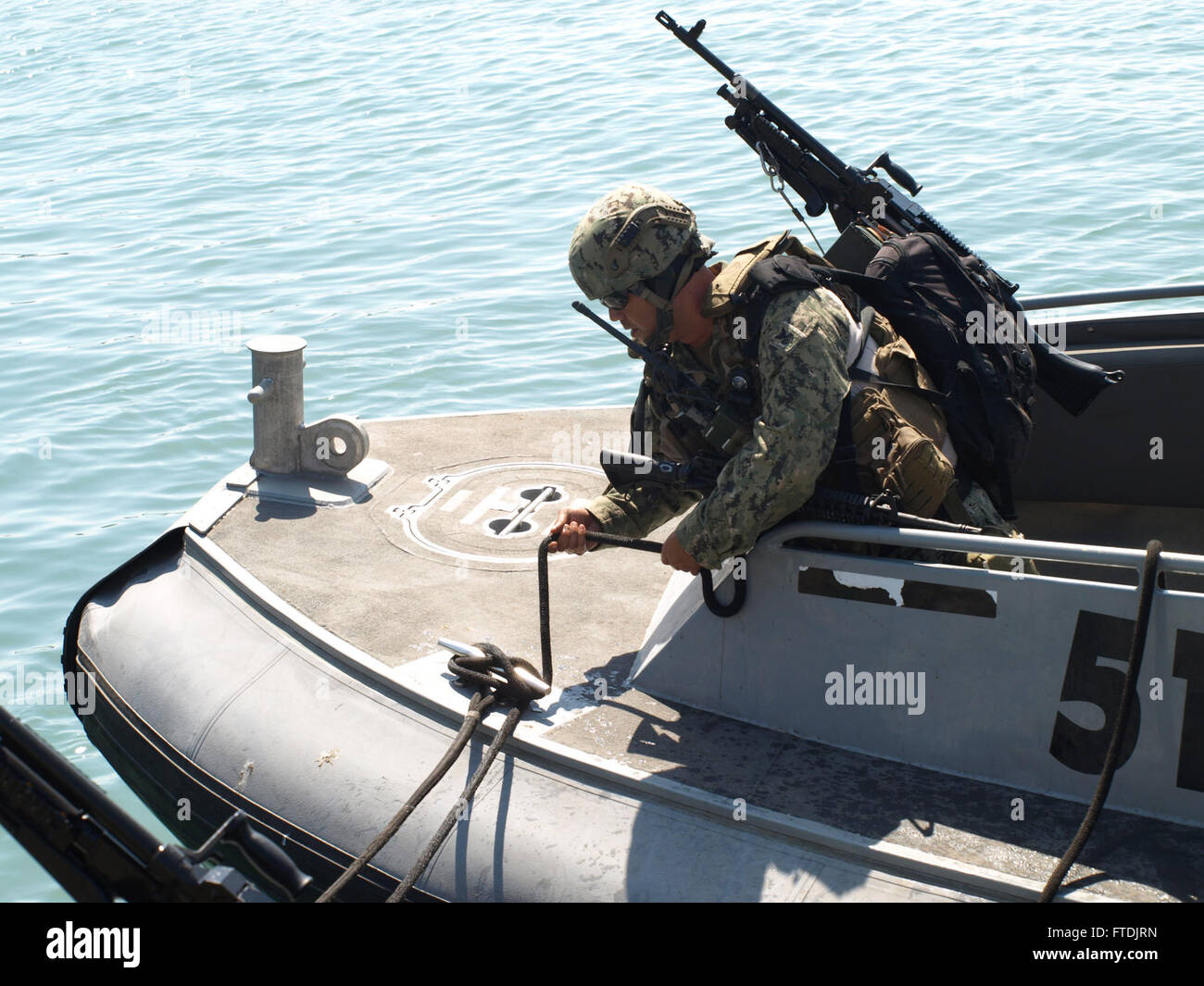 Master-at-Arms 1st Class Thomas Sexton, assigned to Coastal Riverine ...
