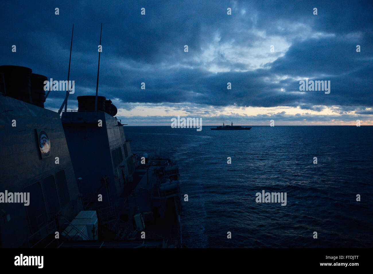 Sailors aboard USS Ross (DDG 71) perform anti-submarine warfare ...
