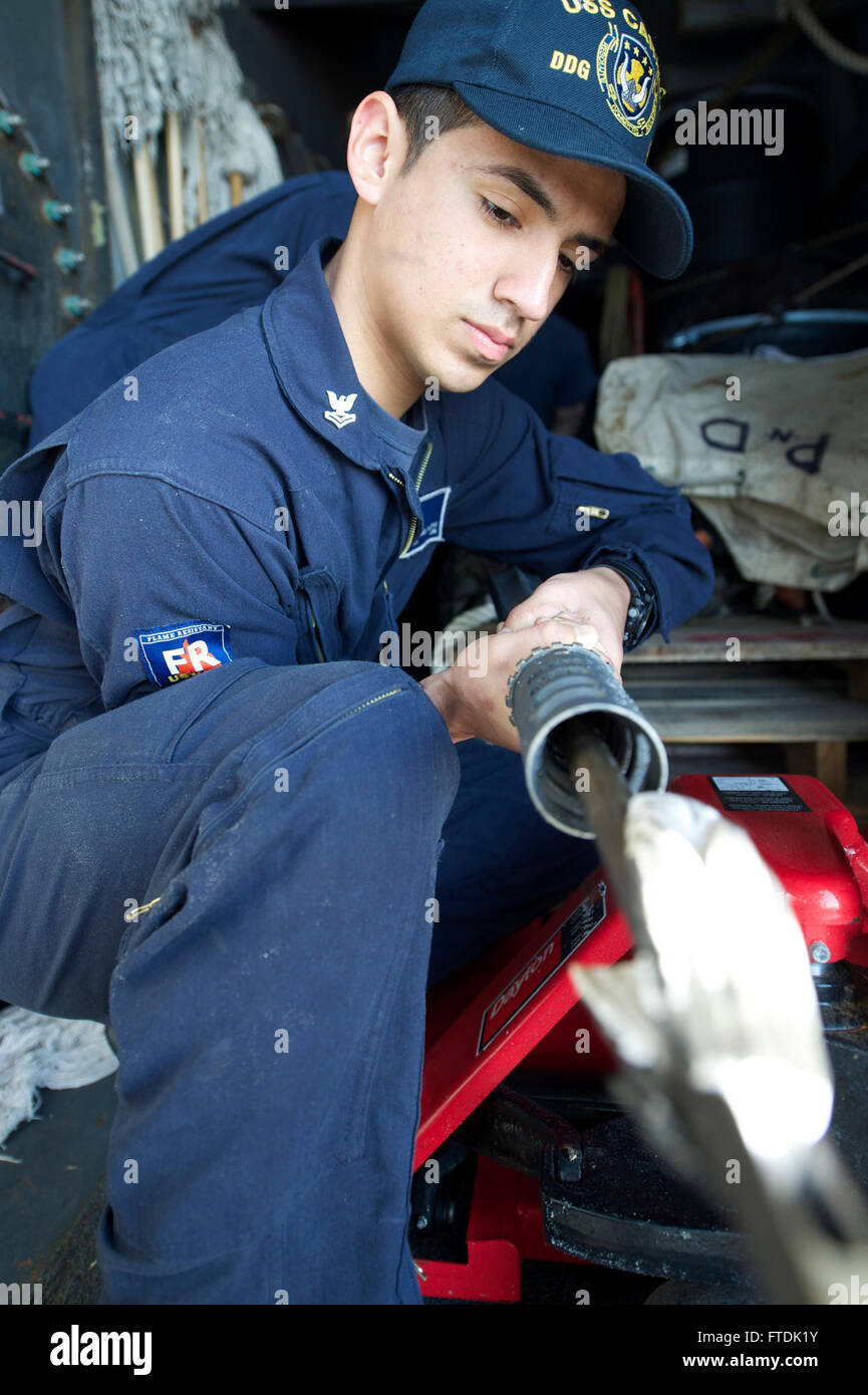 A U.S. Navy photo of Fire Controlman 2nd Class Azareel Castro ...