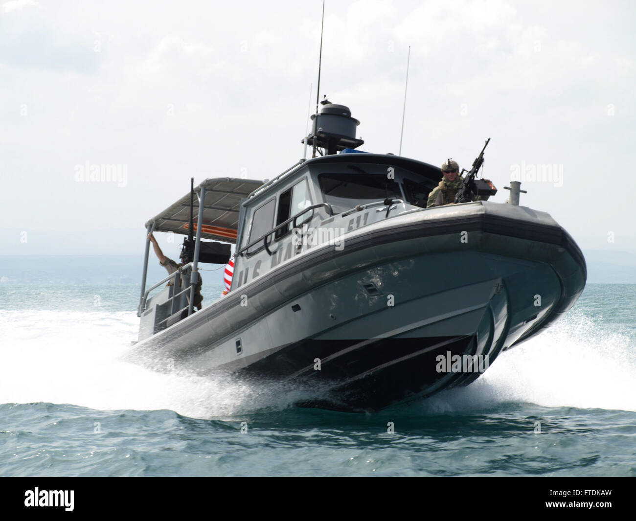Hospital Corpsman 2nd Class Dustin Burton of Coastal Riverine Squadron ...