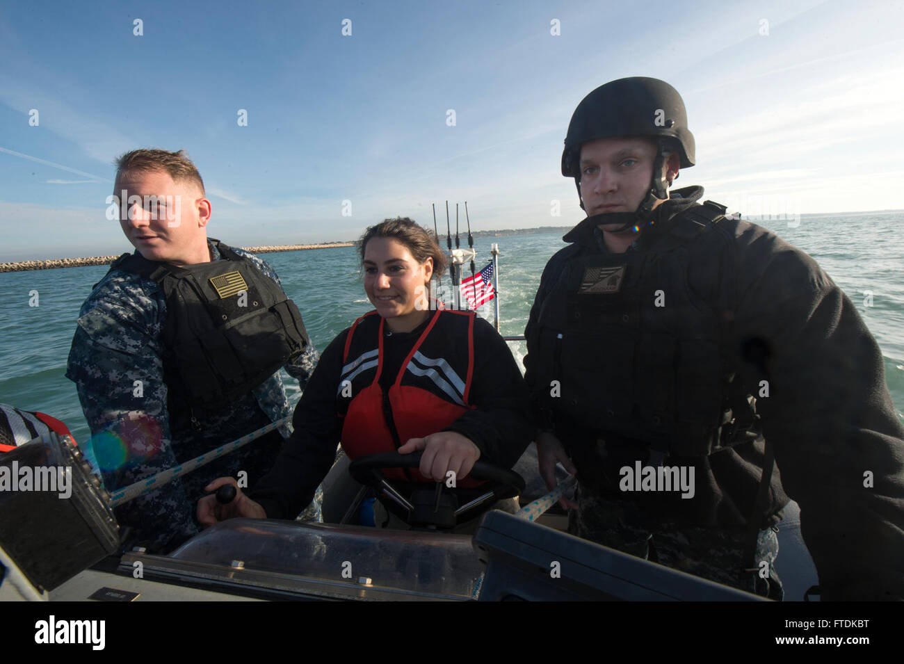 Personnel aboard the USNS Spearhead (T-EPF 1), including Engineman 2nd ...