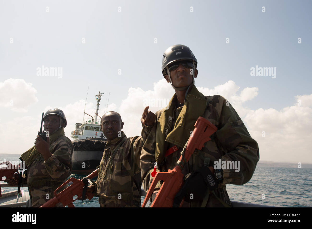 U.S. maritime forces of Djibouti secure a patrol boat during a training ...