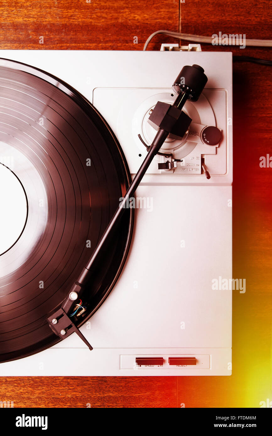 Turntable player with musical vinyl record. Useful for DJ, nightclub ...