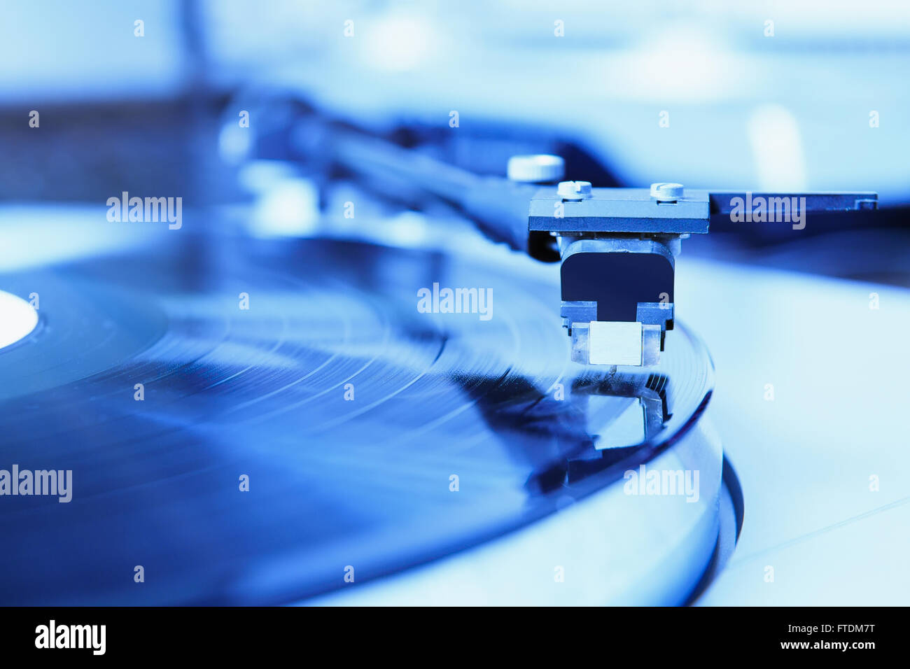 Turntable player with musical vinyl record. Useful for DJ, nightclub ...