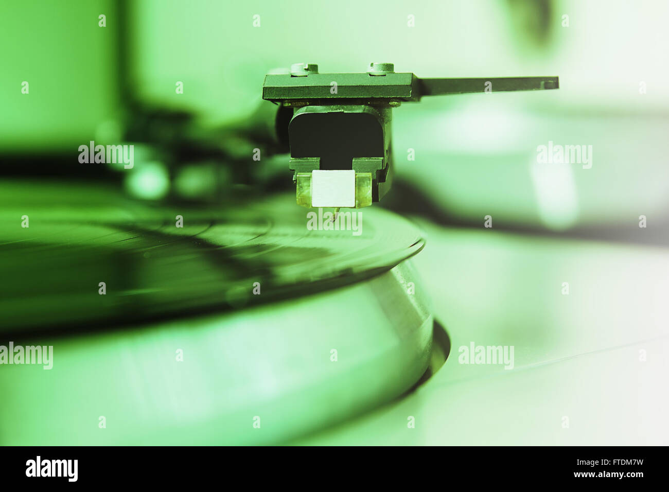 Turntable player with musical vinyl record. Useful for DJ, nightclub ...