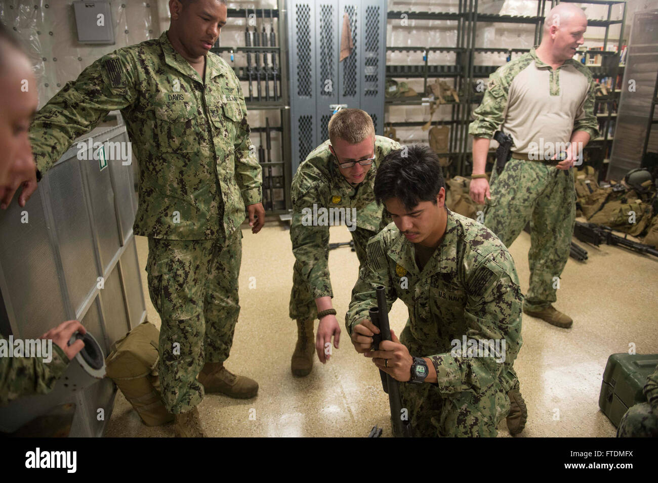 Members of the security team aboard the USNS Spearhead (T-EPF 1 ...