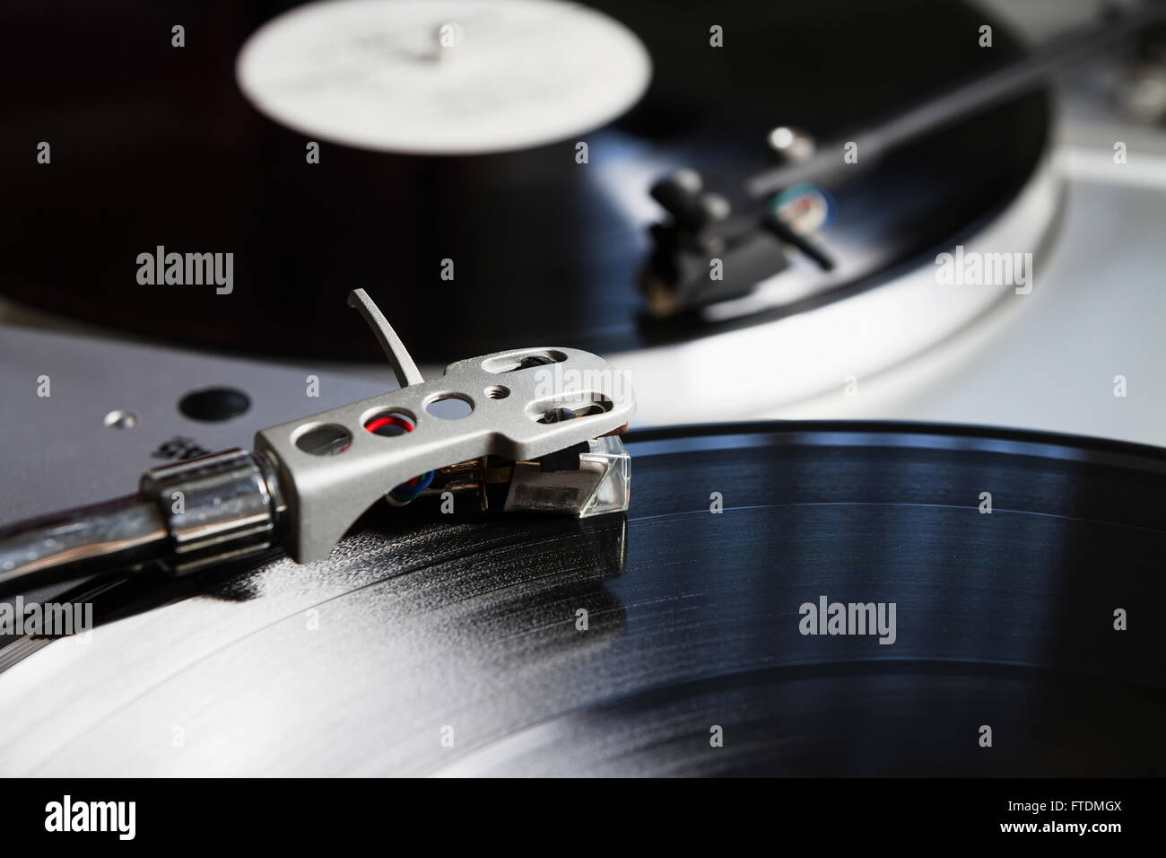 Turntable player with musical vinyl record. Useful for DJ, nightclub ...
